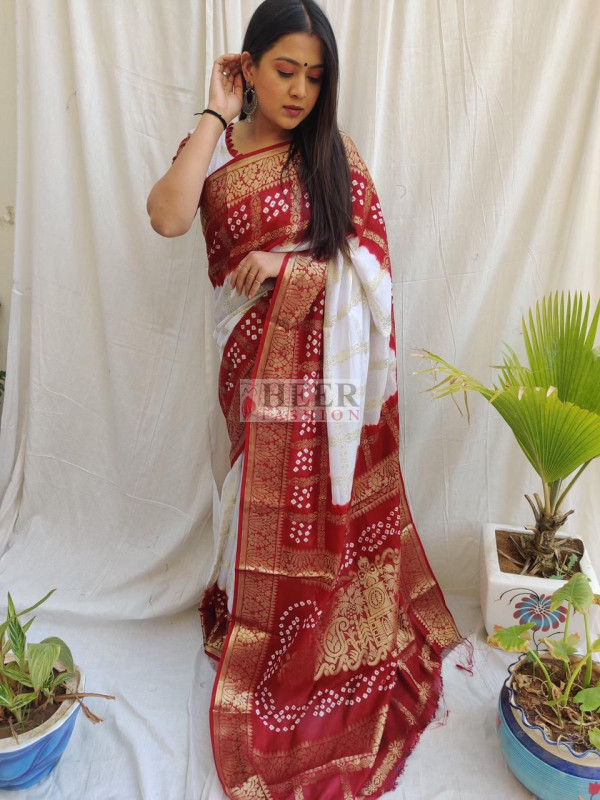 White and red color art silk saree with zari weaving work