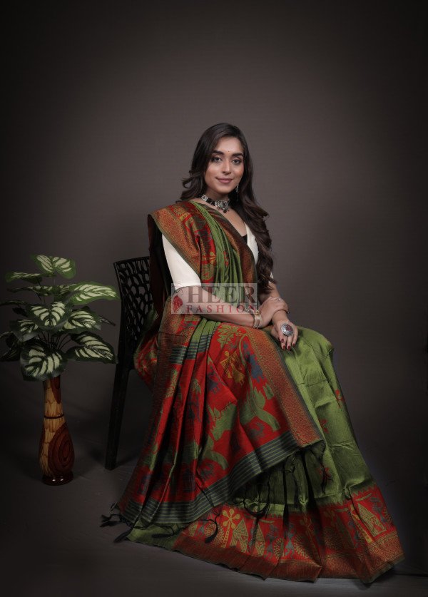 Mahendi green color handloom raw silk saree with zari woven work