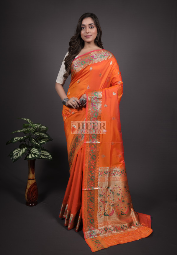 Orange color paithani silk saree with zari weaving work