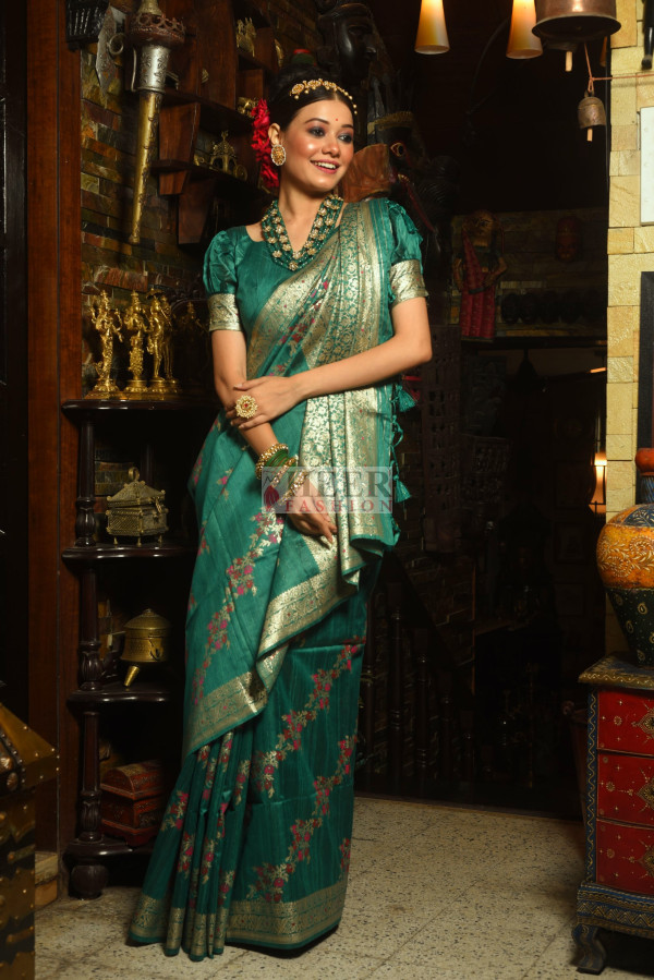 Rama green color tussar silk saree with zari woven work