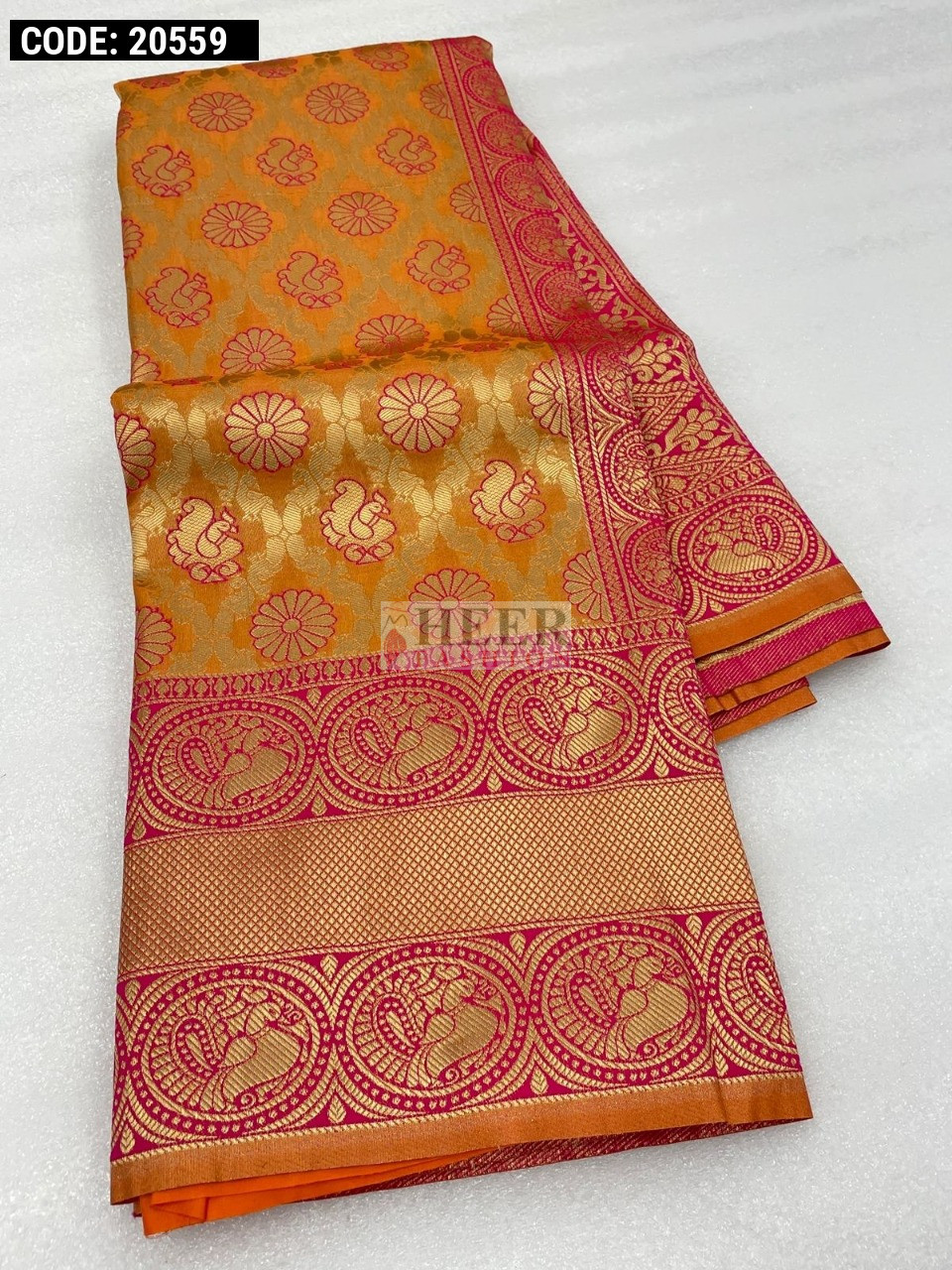 Peach color kanchipuram silk saree with zari weaving work