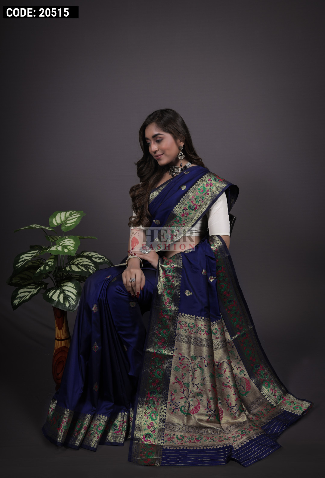 Navy blue color paithani silk saree with zari weaving work