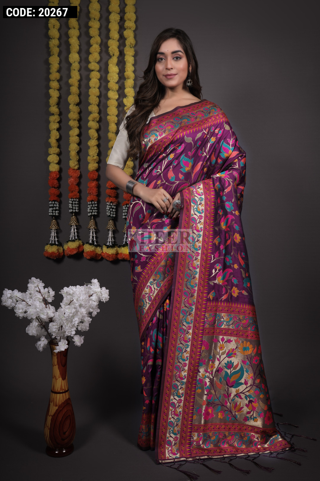 Magenta color paithani silk saree with zari weaving work