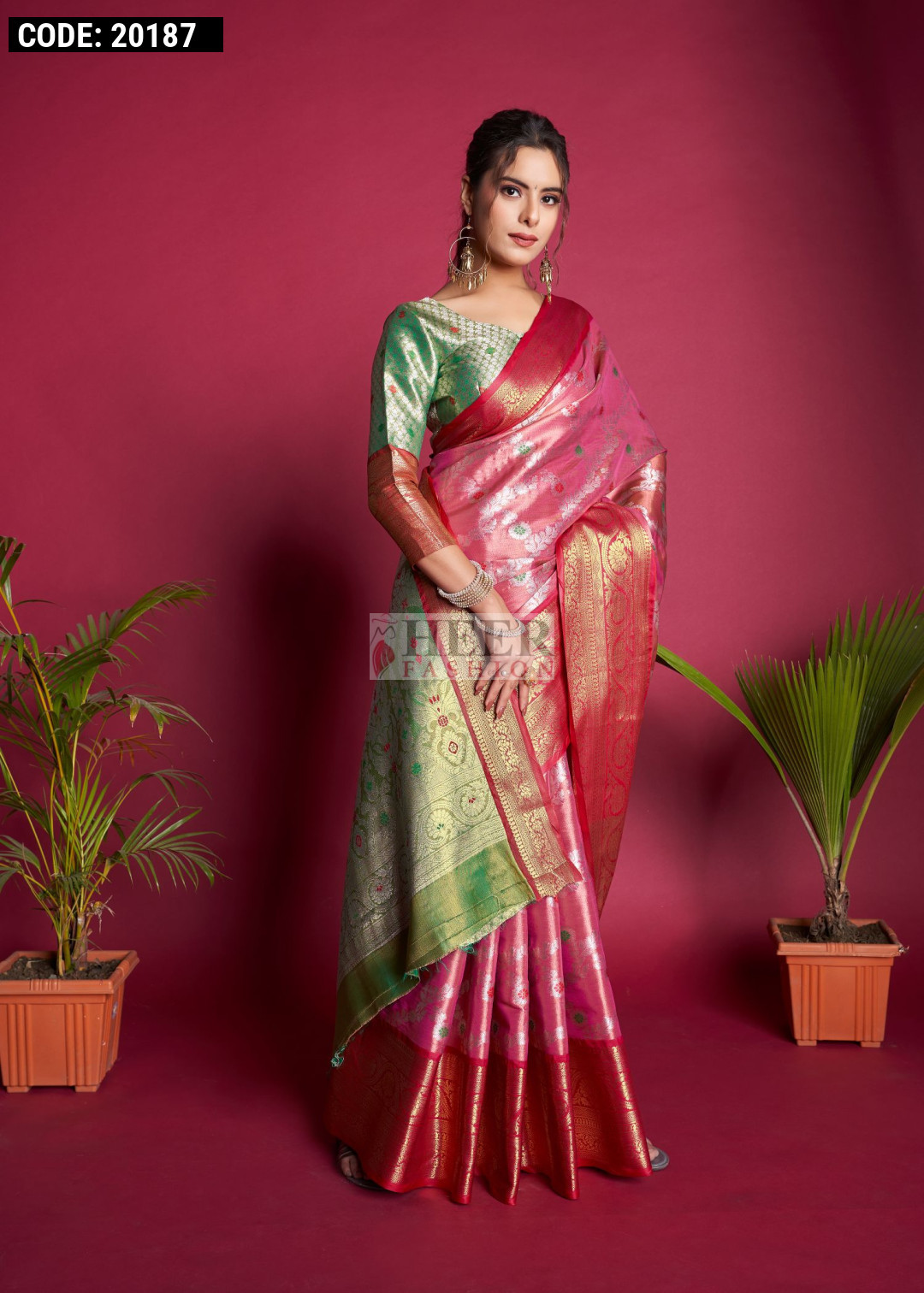 Magenta color banarasi silk saree with zari woven work
