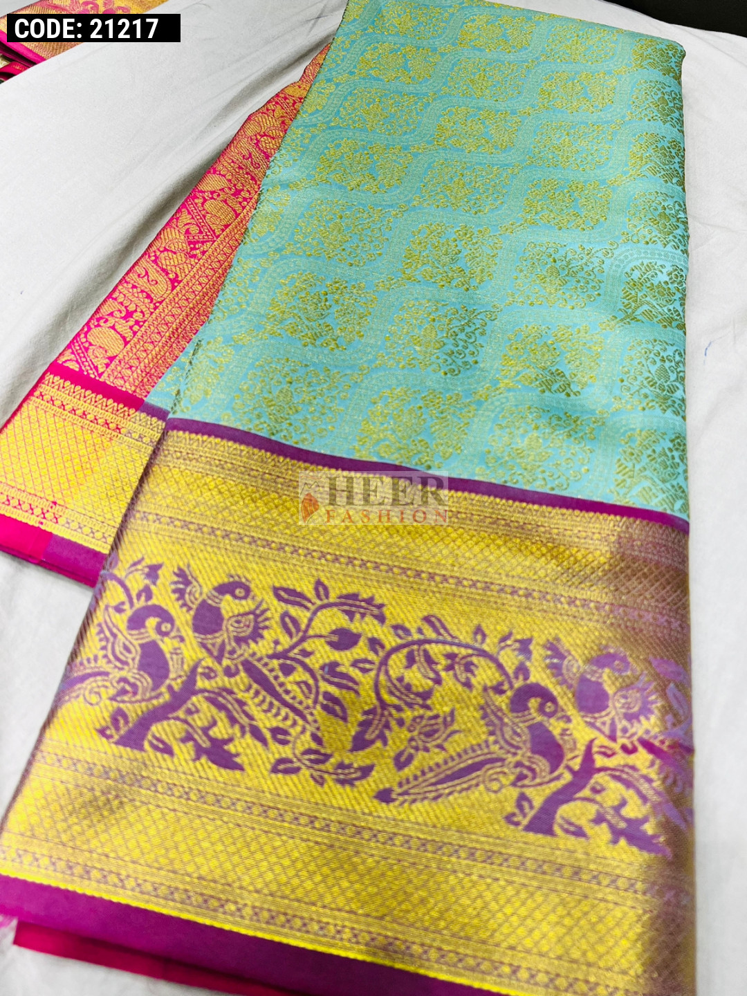 Sea green color kanchipuram silk saree with zari weaving work