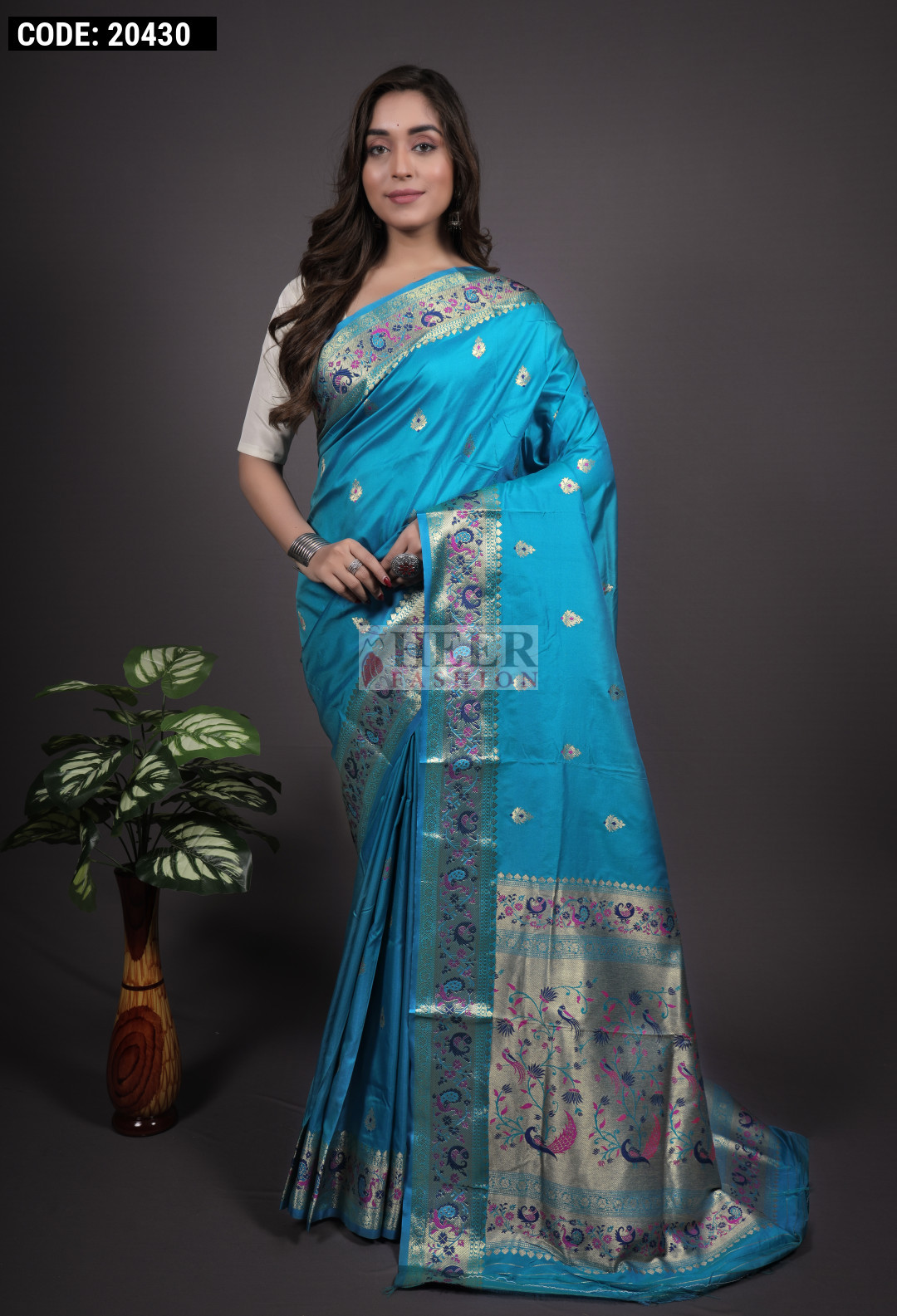 Firoji color paithani silk saree with zari weaving work