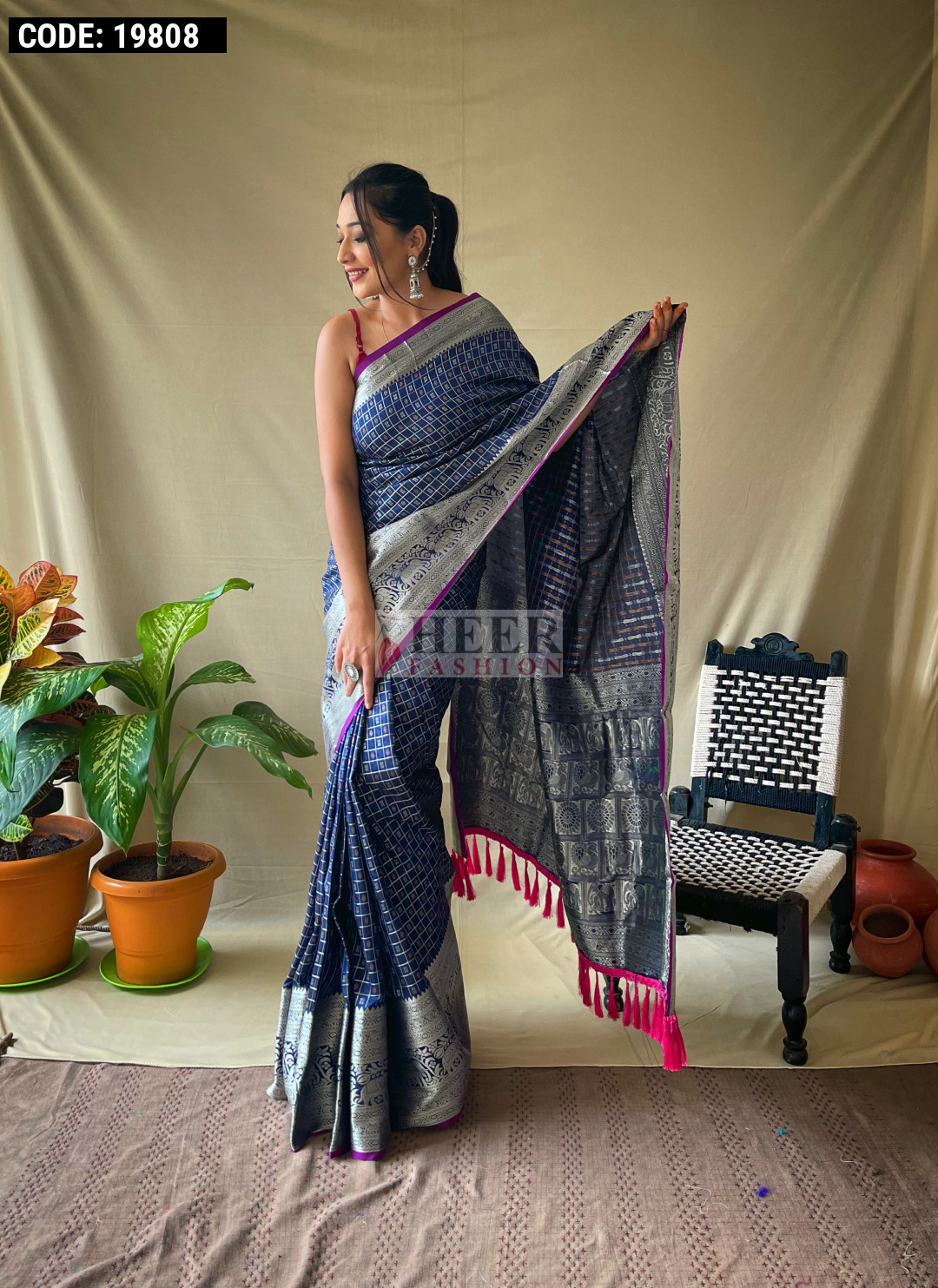 Navy blue color banarasi silk saree with zari weaving work
