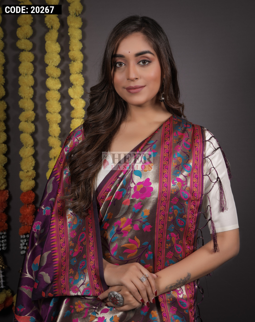 Magenta color paithani silk saree with zari weaving work