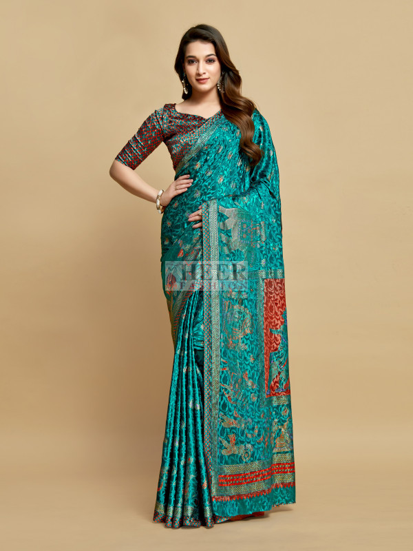 Rama green color soft jacquard silk saree with foil printed work