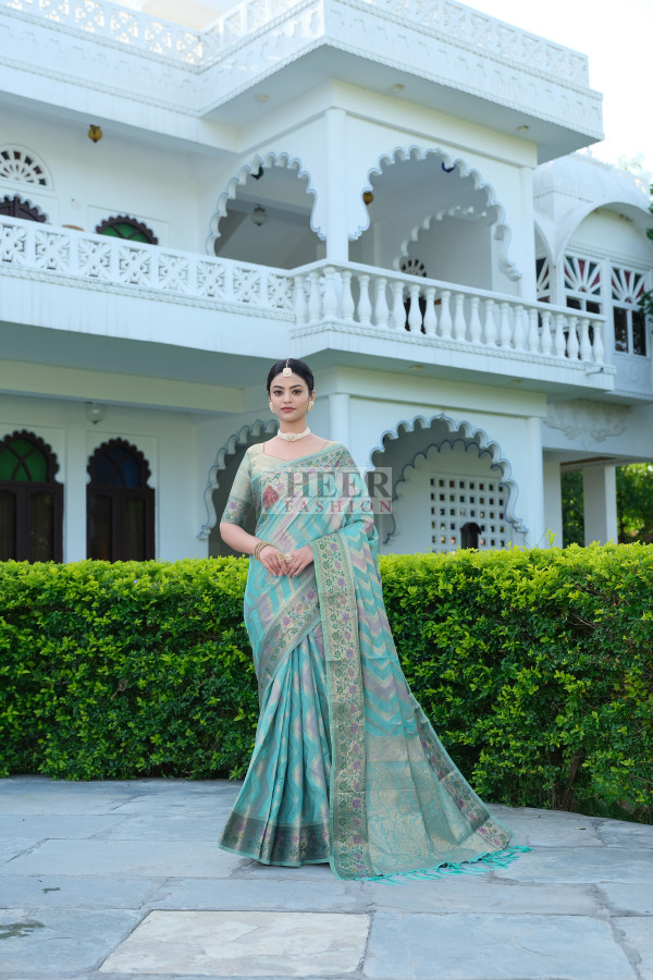 Firoji color soft organza silk saree with zari weaving work