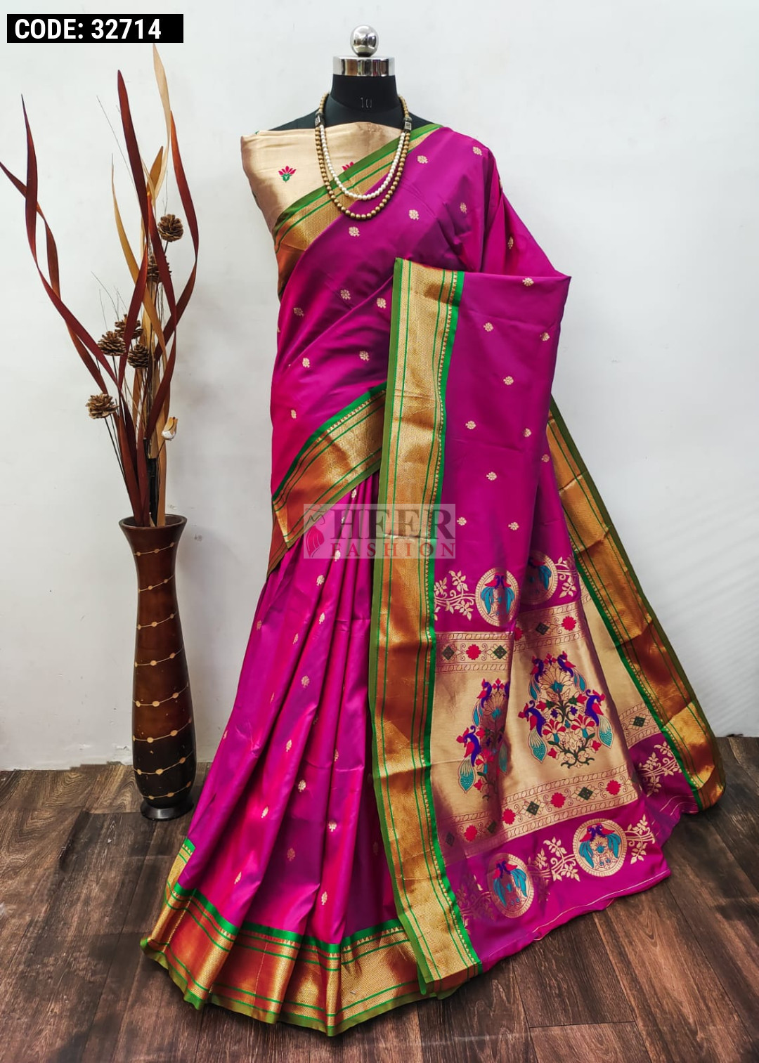 Rani pink color paithani silk saree with zari weaving work