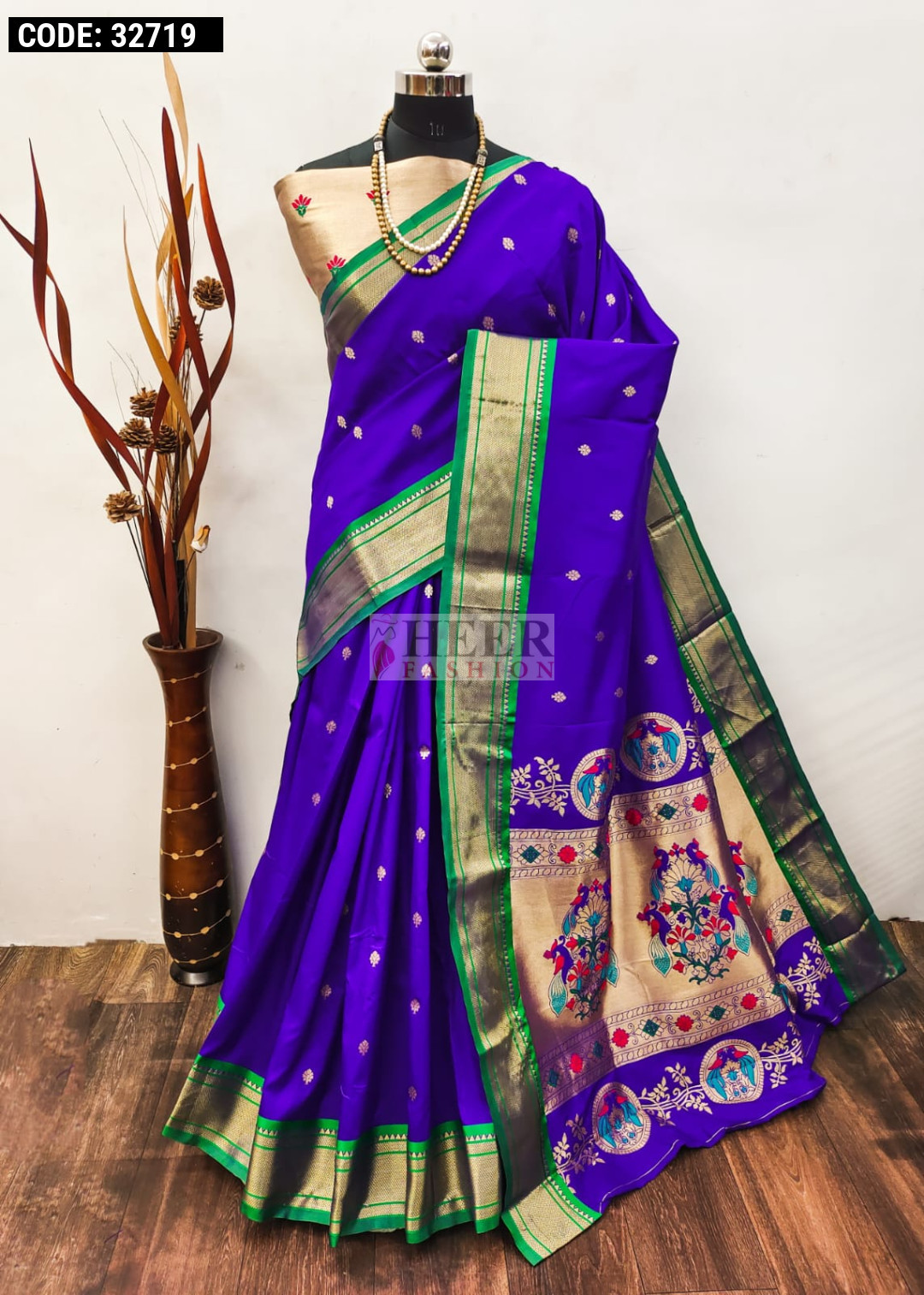 Violet color paithani silk saree with zari weaving work