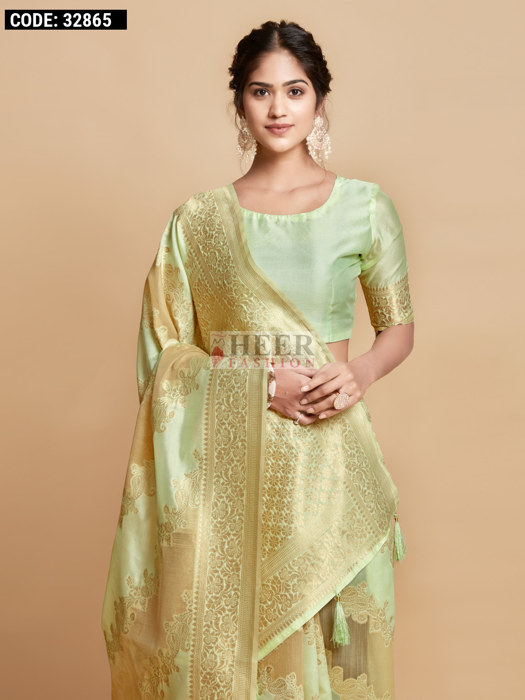 Light pista green color soft linen silk saree with zari weaving work
