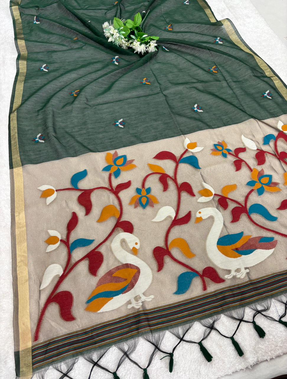 Dark green color soft ghicha silk saree with zari weaving work