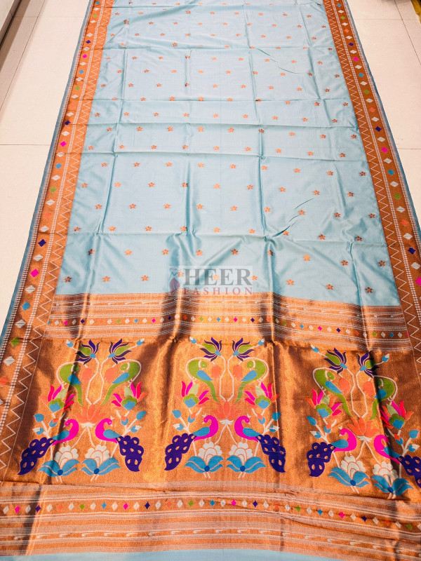 Sky blue color paithani silk saree with zari weaving work