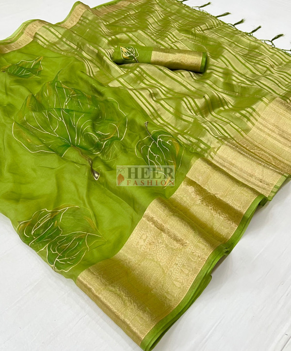 Mahendi green color soft organza silk saree with zari weaving work
