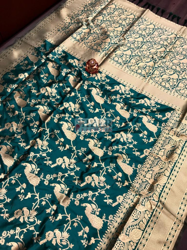Rama green color banarasi silk saree with zari weaving work