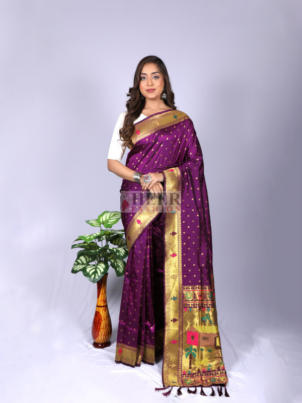 Magenta color paithani silk saree with zari weaving work