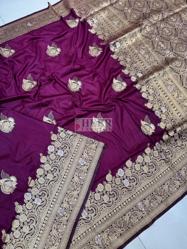 Magenta color dola silk saree with zari weaving work