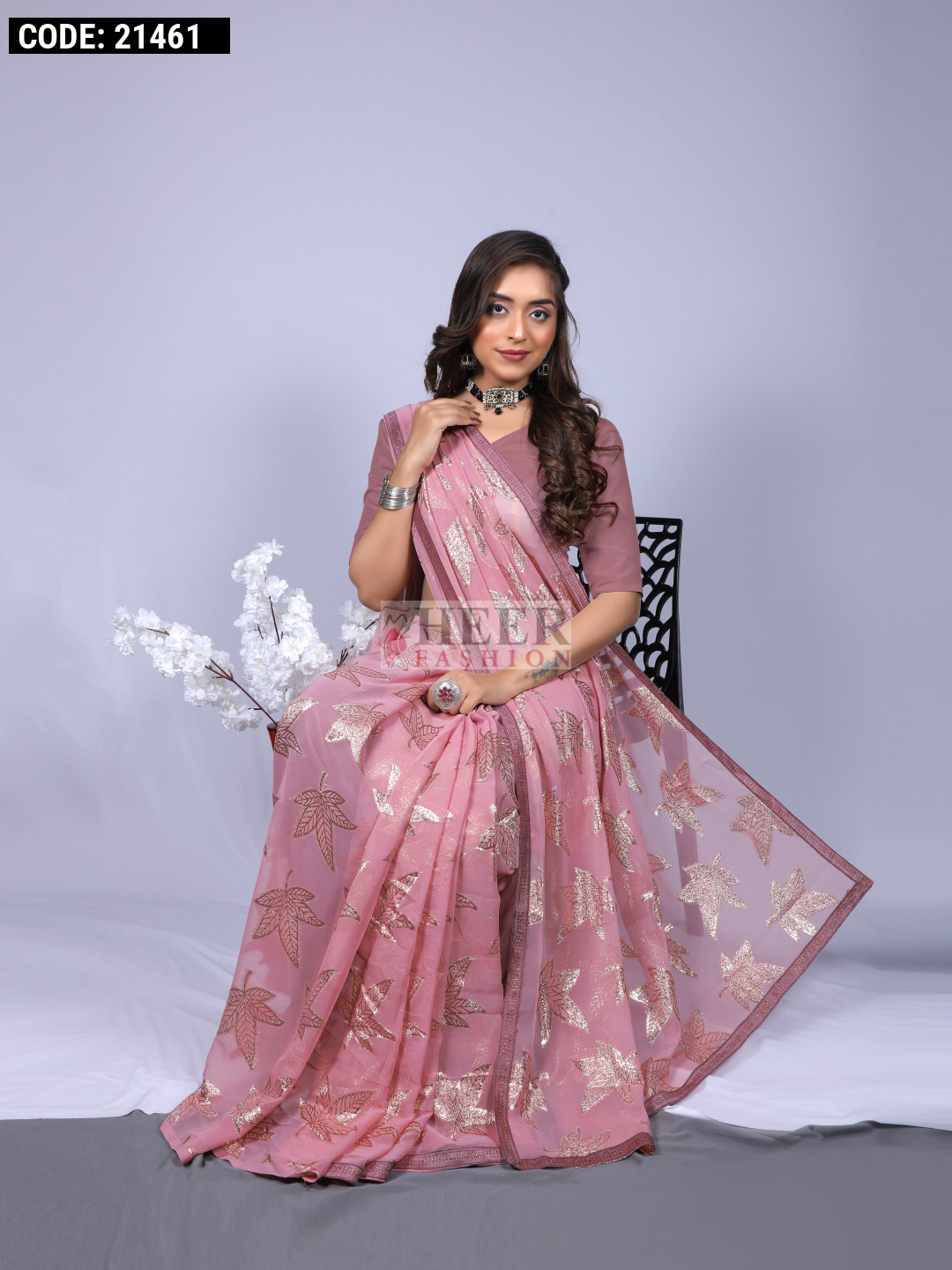Baby pink color soft georgette saree with zari weaving work