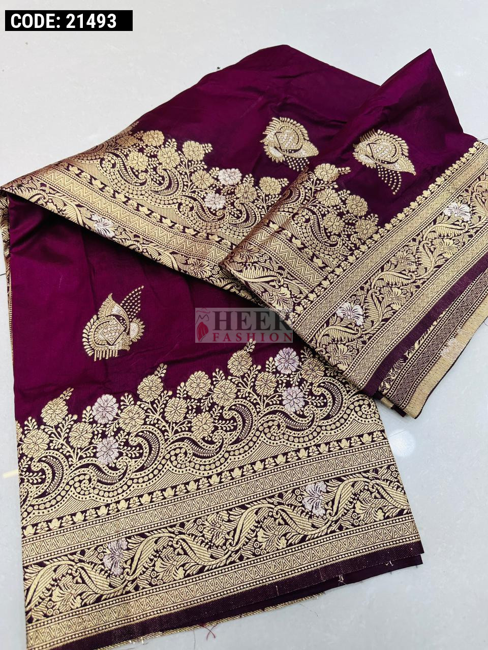 Magenta color dola silk saree with zari weaving work