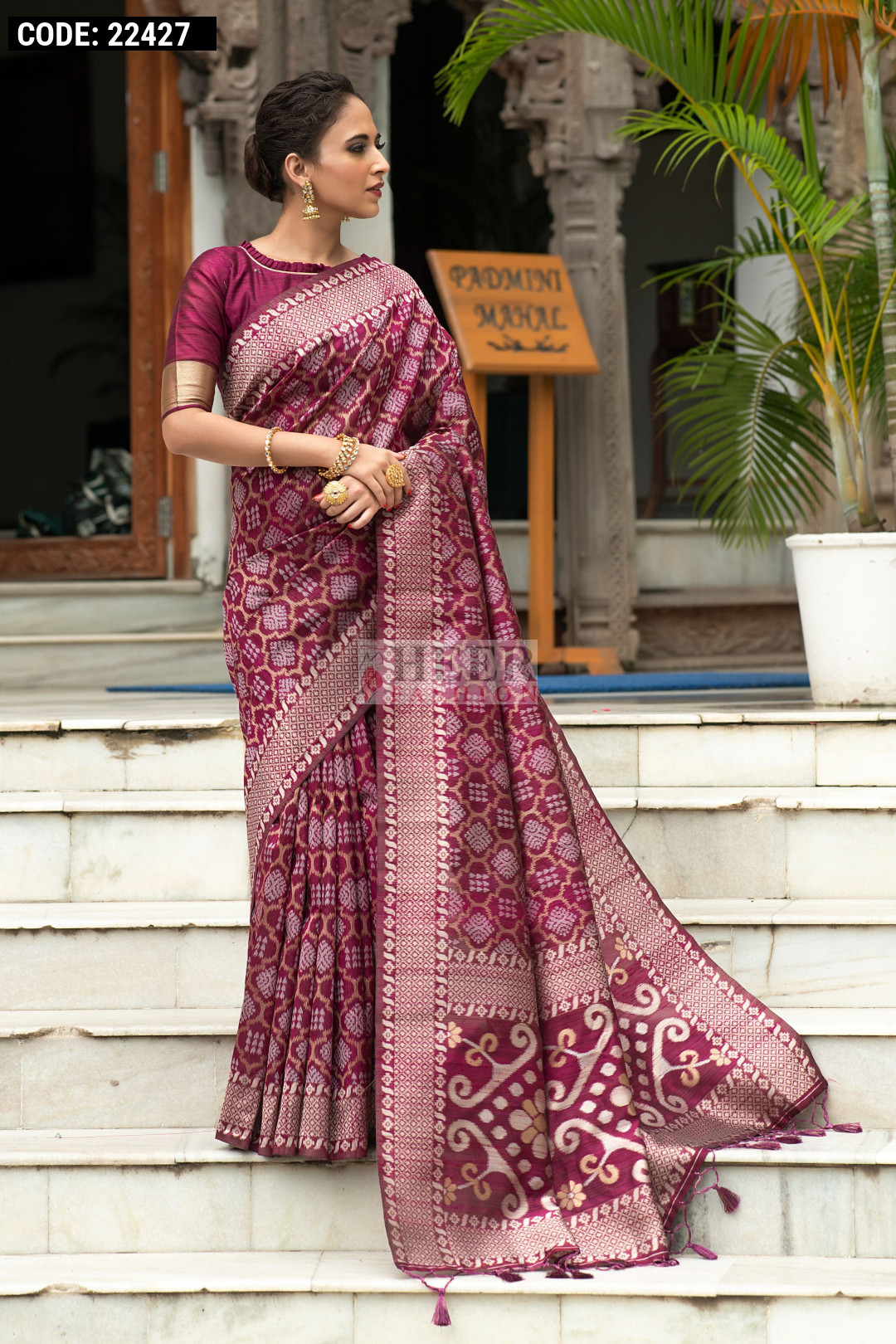 Magenta color tussar silk saree with woven design