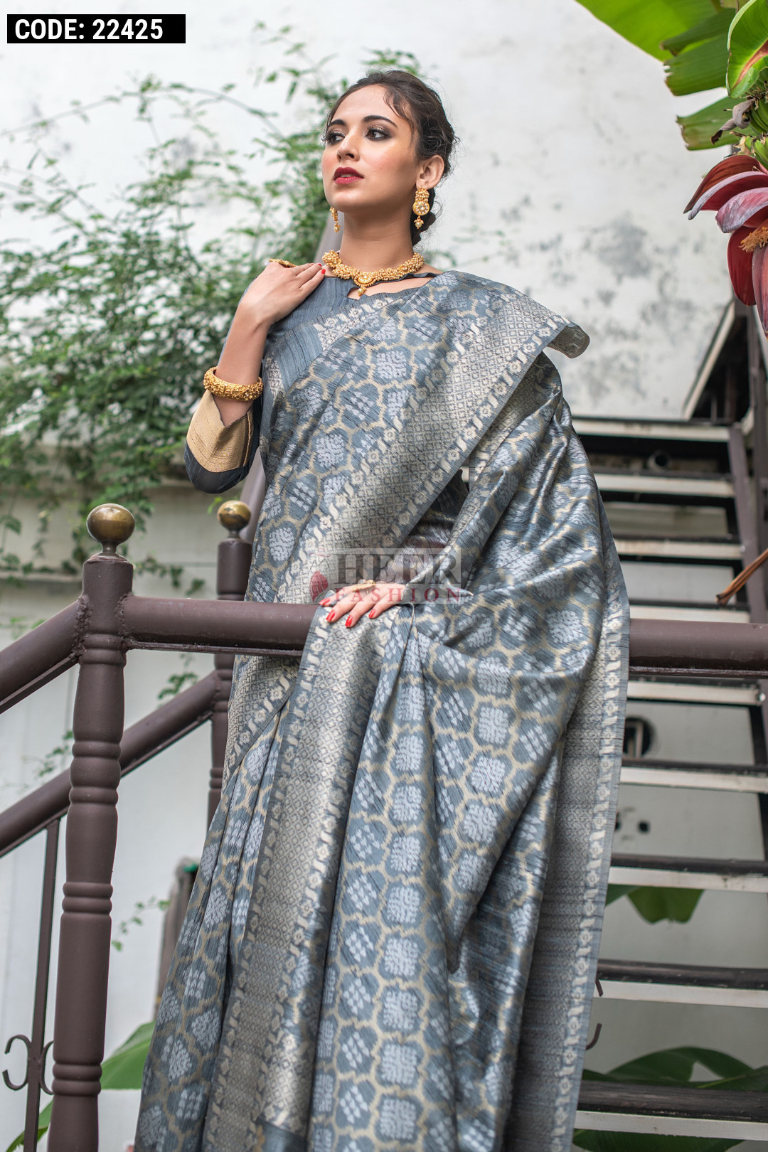 Gray color tussar silk saree with woven design