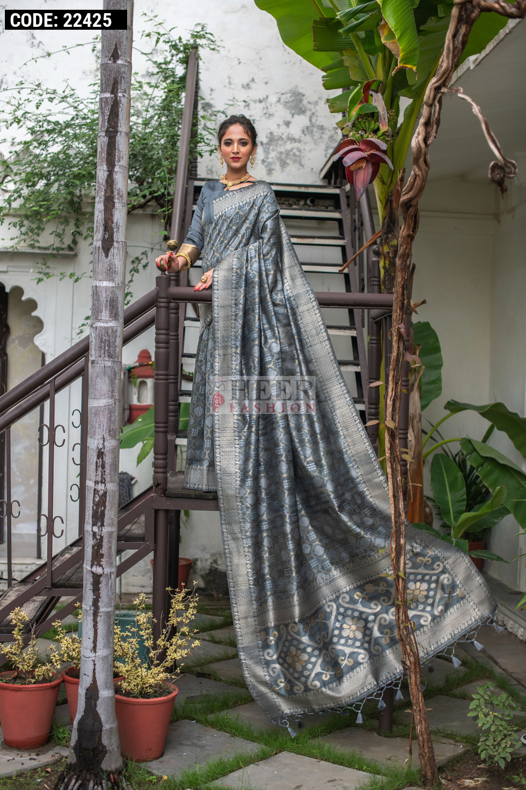 Gray color tussar silk saree with woven design