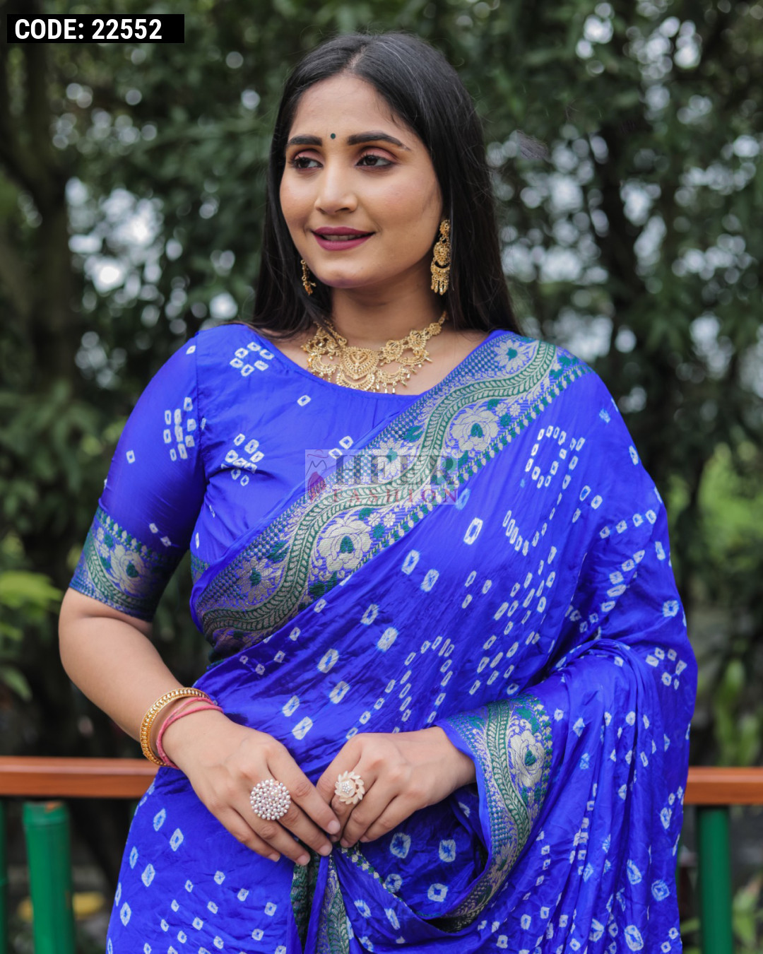 Royal blue color bandhej silk saree with zari weaving work