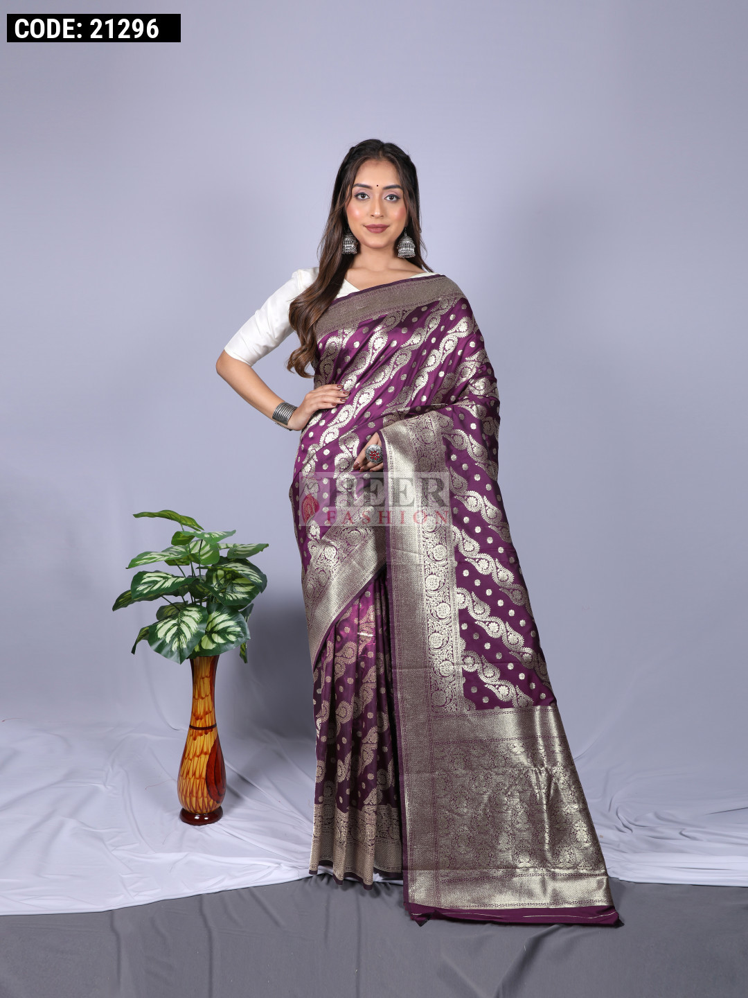Magenta color banarasi silk saree with zari weaving work
