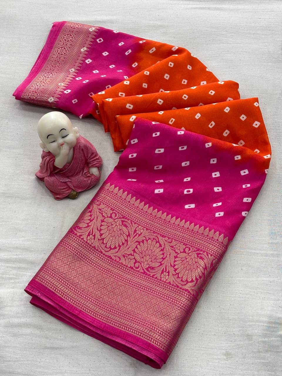 Orange and pink hand bandhej bandhani saree with zari weaving border ...