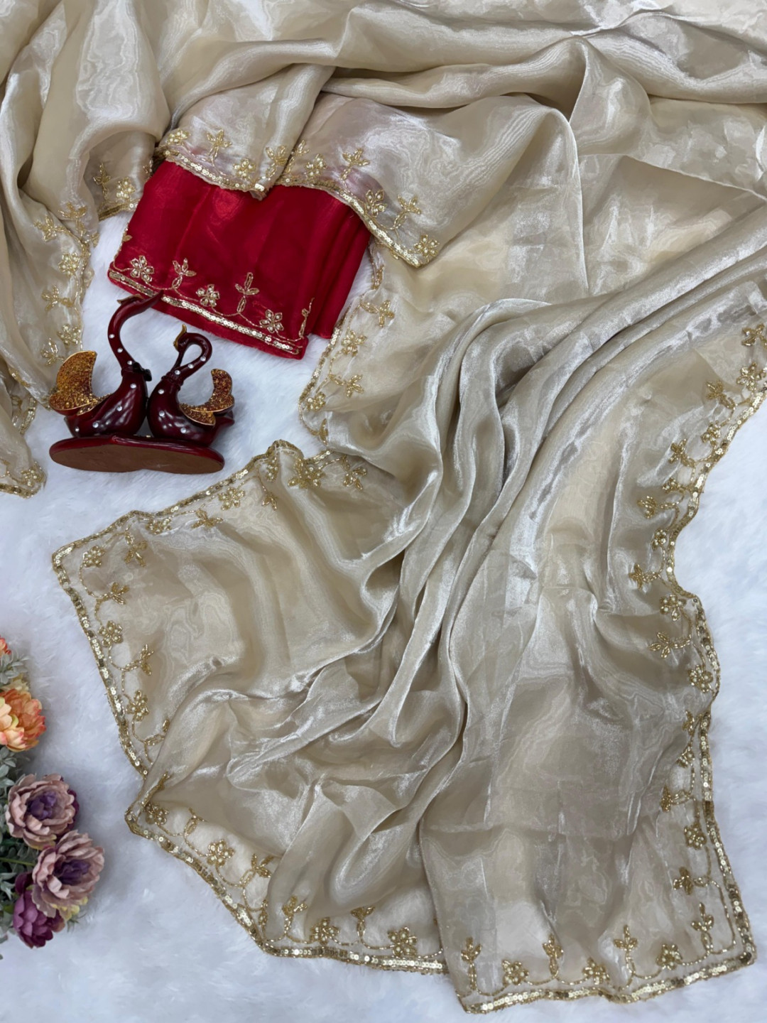 Beige jimmy choo saree with Beautiful khatli work and Handwork border