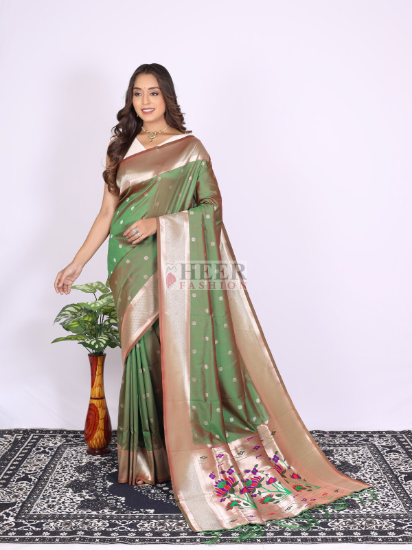 Mahendi green color paithani silk saree with zari weaving work