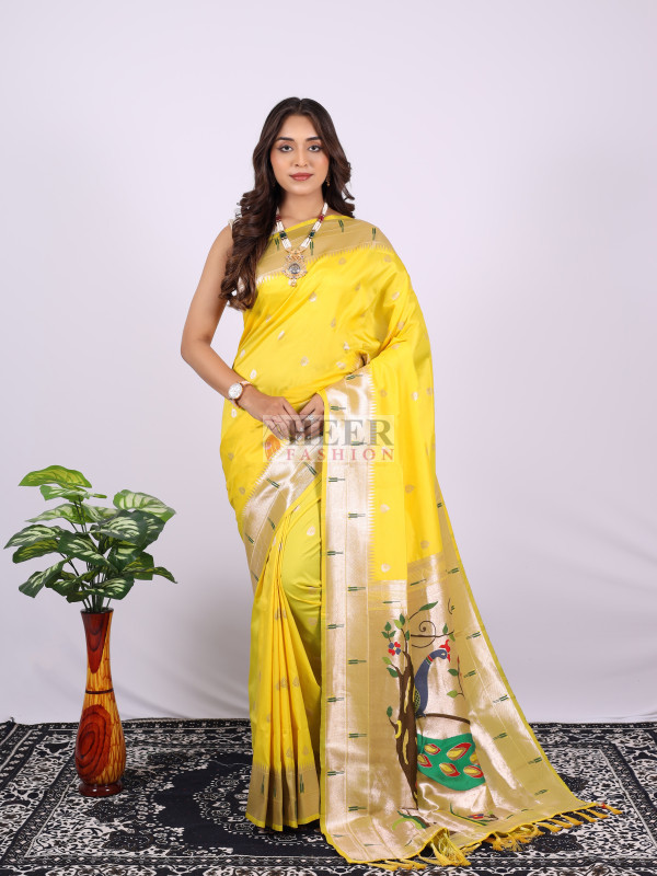 Yellow color paithani silk saree with zari weaving work