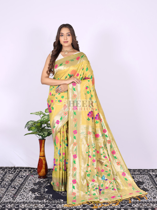 Yellow color paithani silk saree with zari weaving work