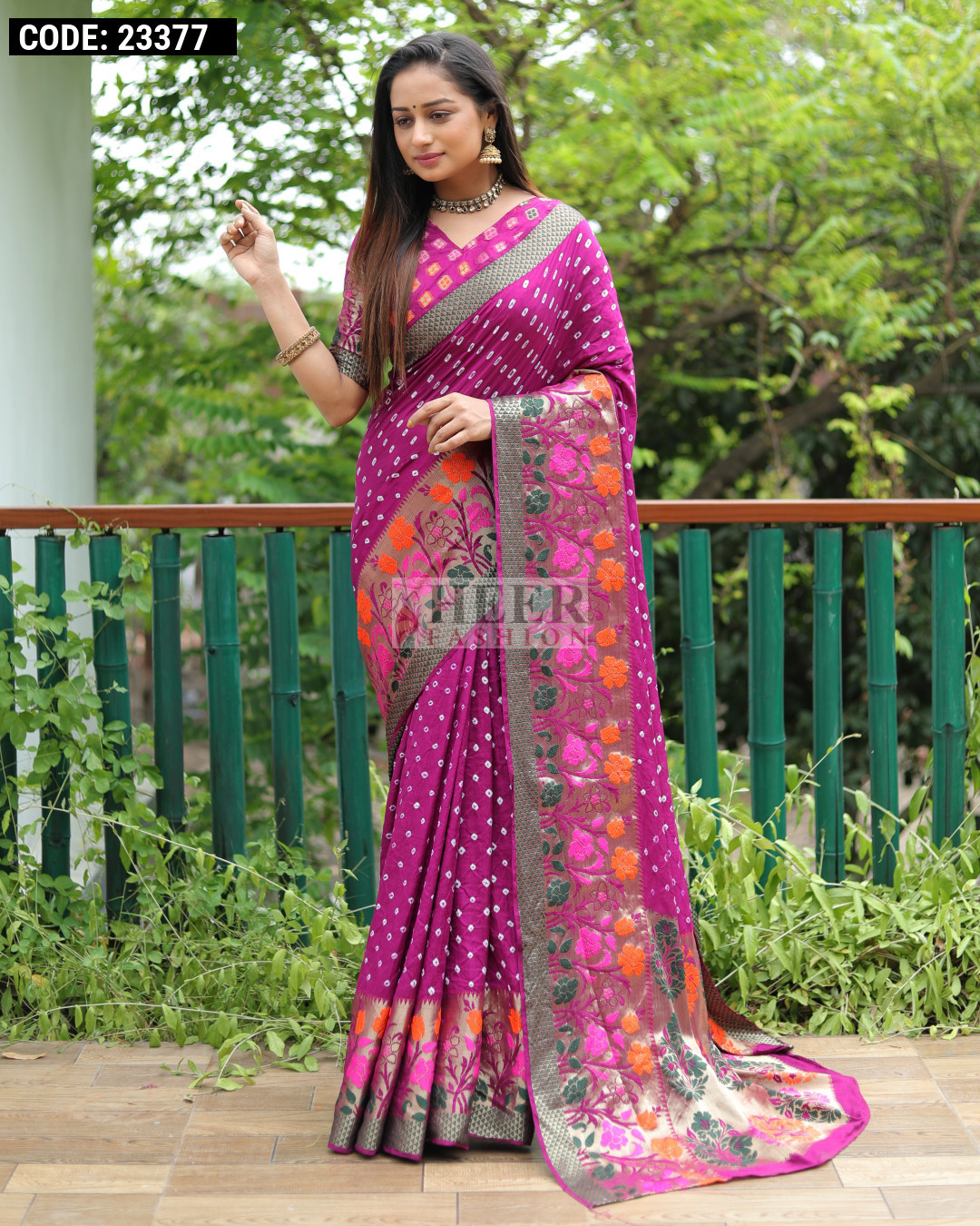 Magenta color bandhej silk saree with woven design