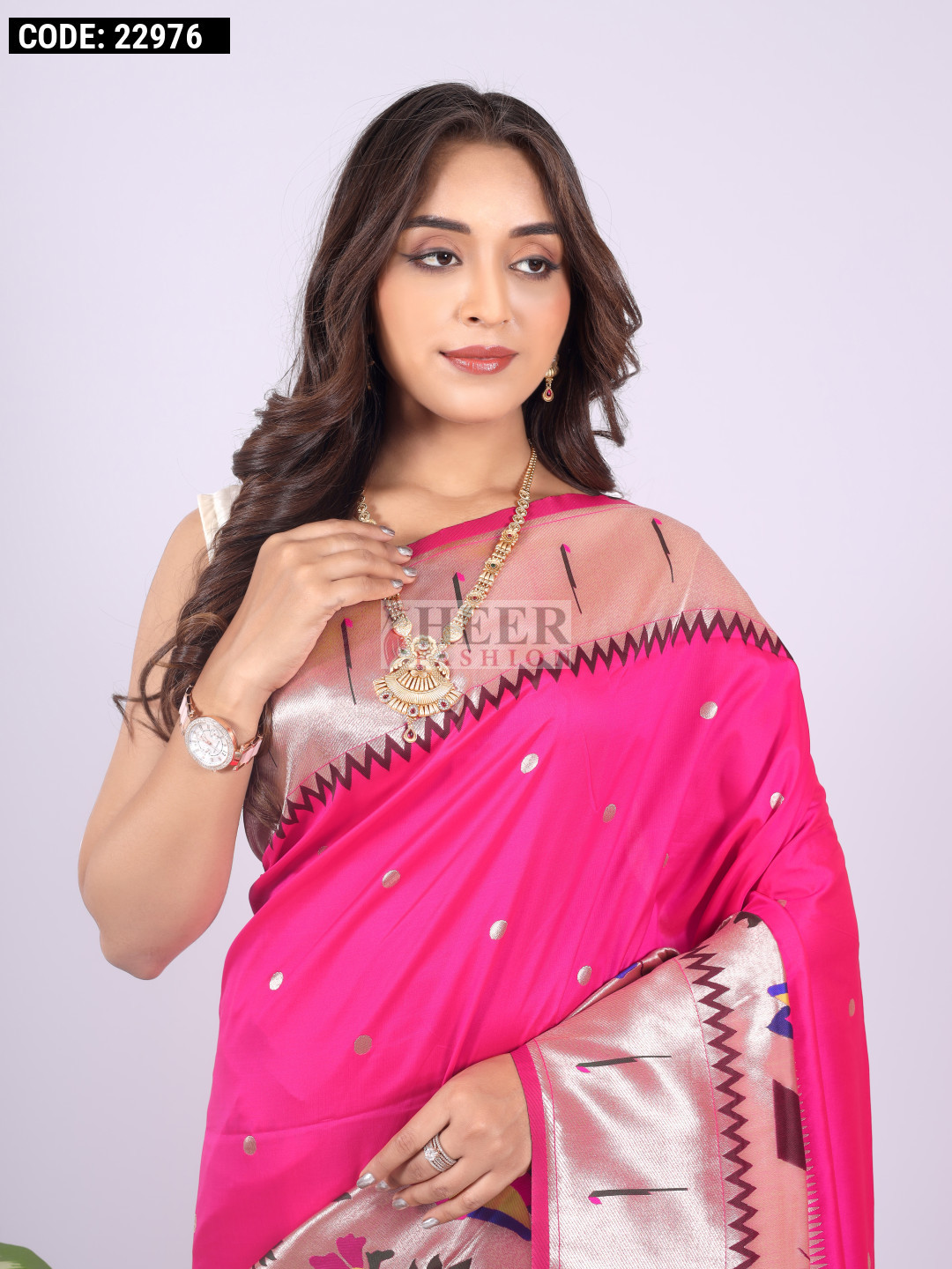Rani pink color paithani silk saree with zari weaving work
