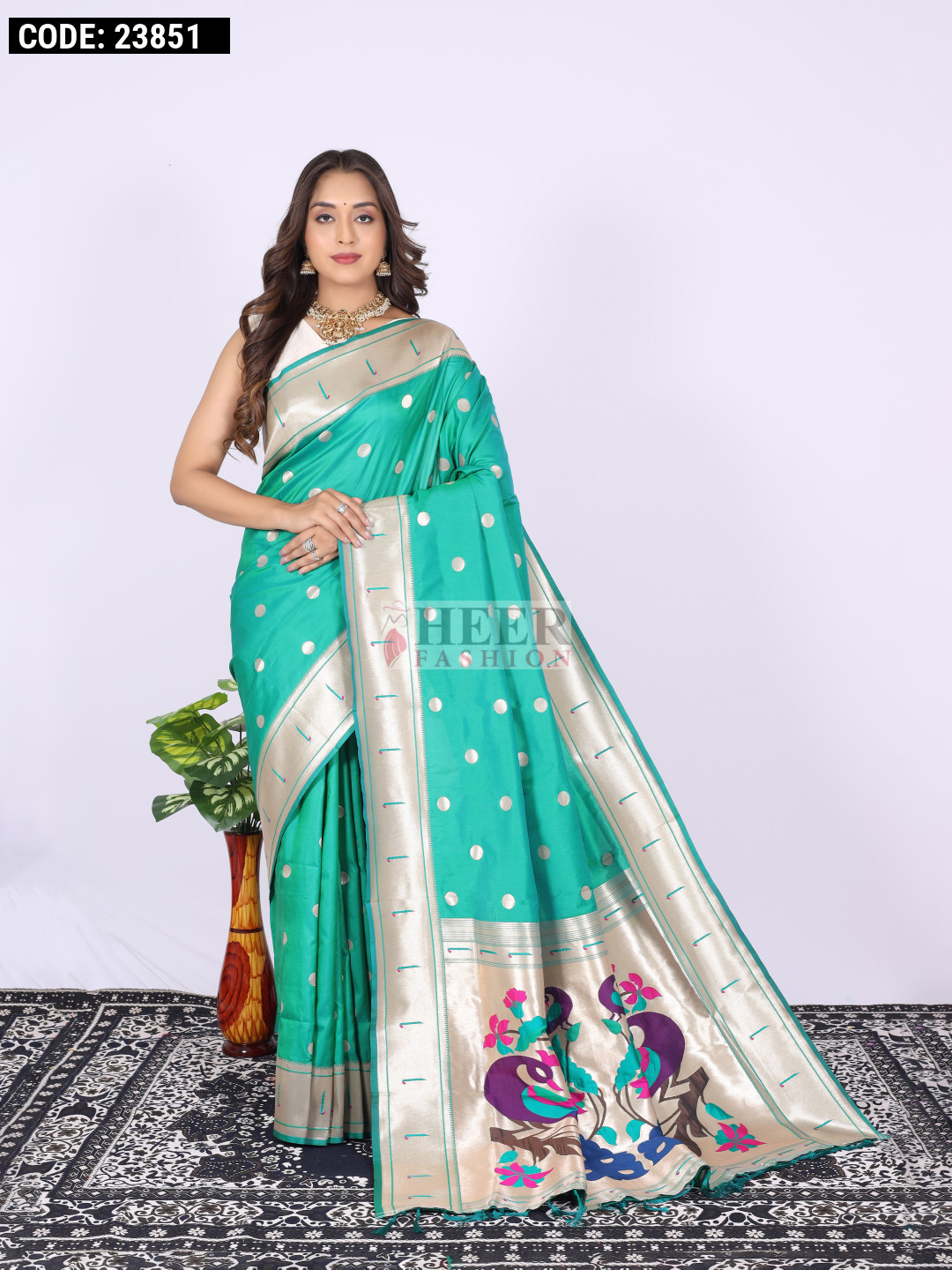 Rama green color paithani silk saree with zari weaving work