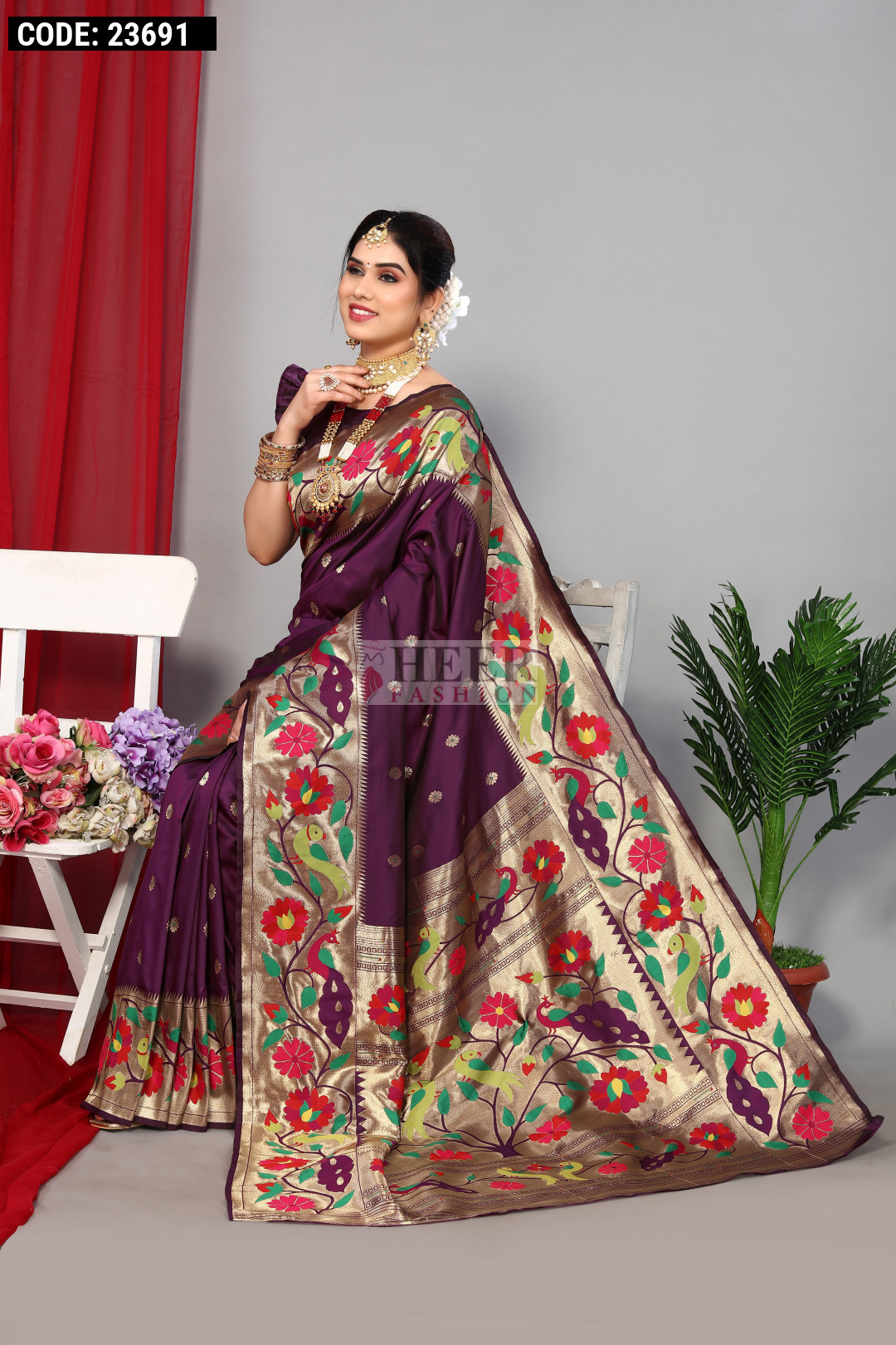 Magenta color paithani silk saree with zari weaving work