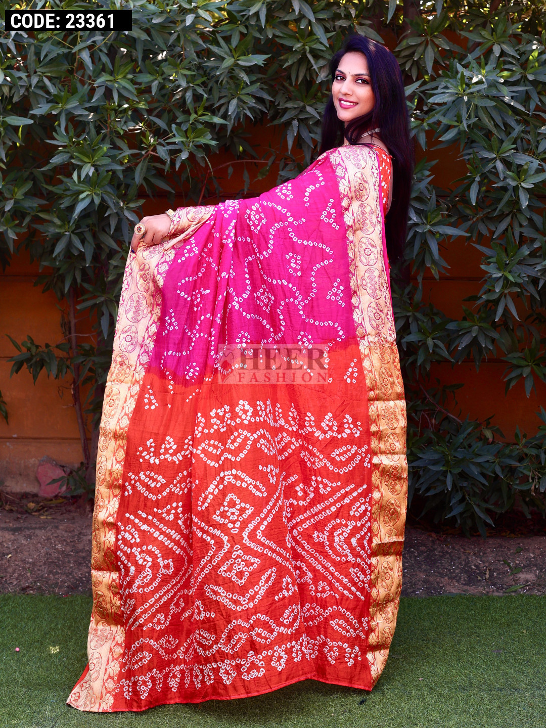 Rani pink color bandhani silk saree with hand bandhej work