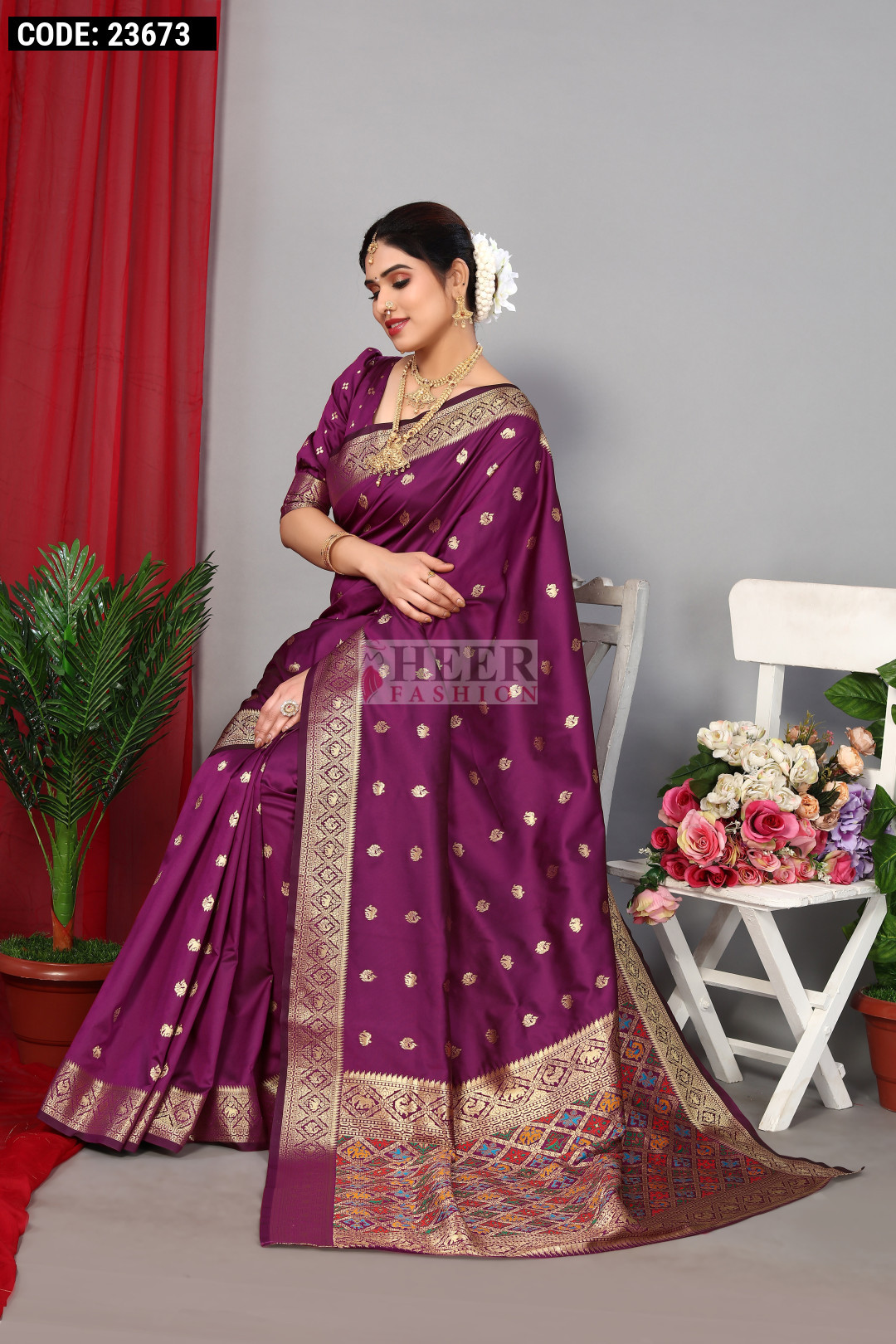 Magenta color paithani silk saree with zari weaving work