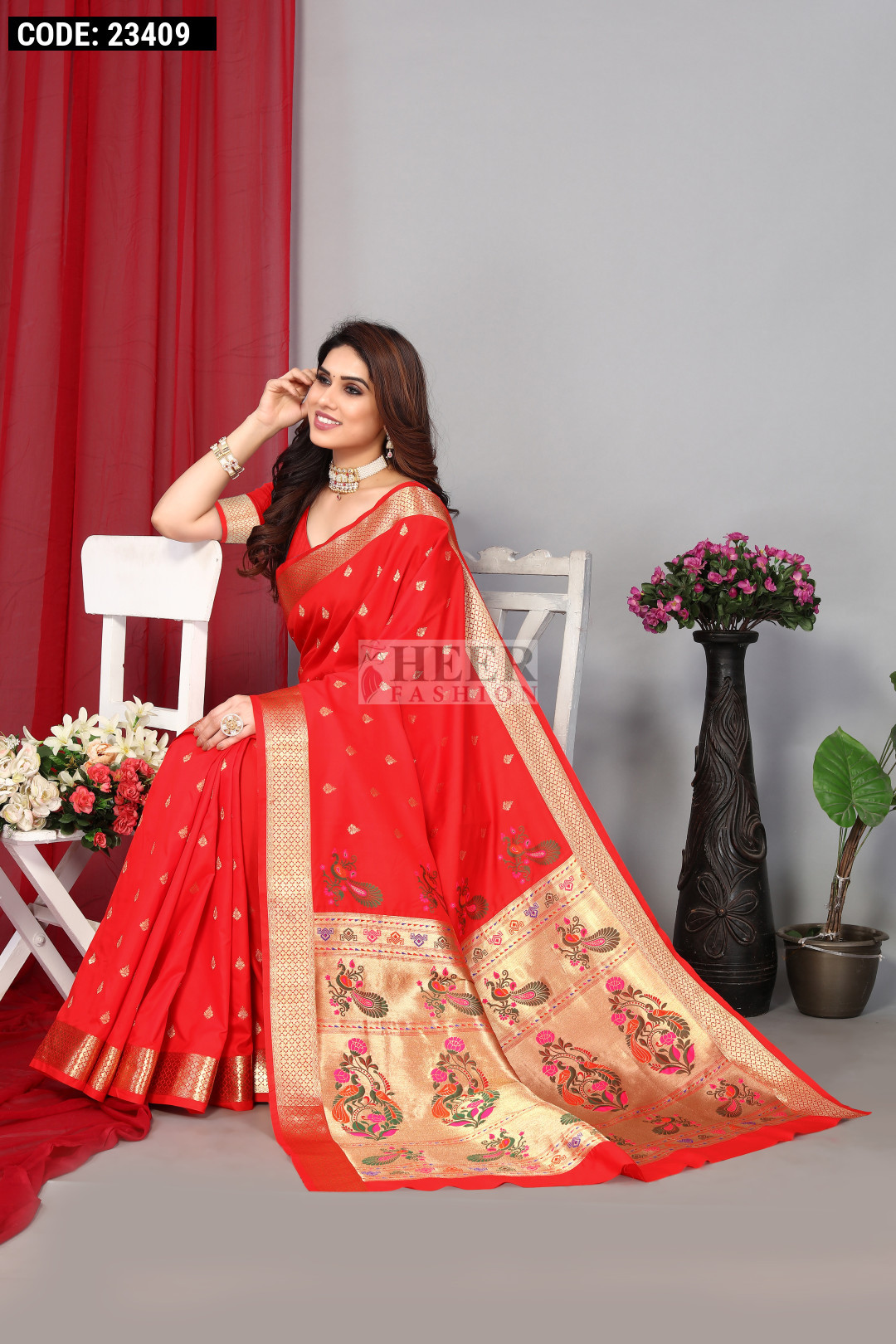 Red color paithani silk saree with zari weaving work
