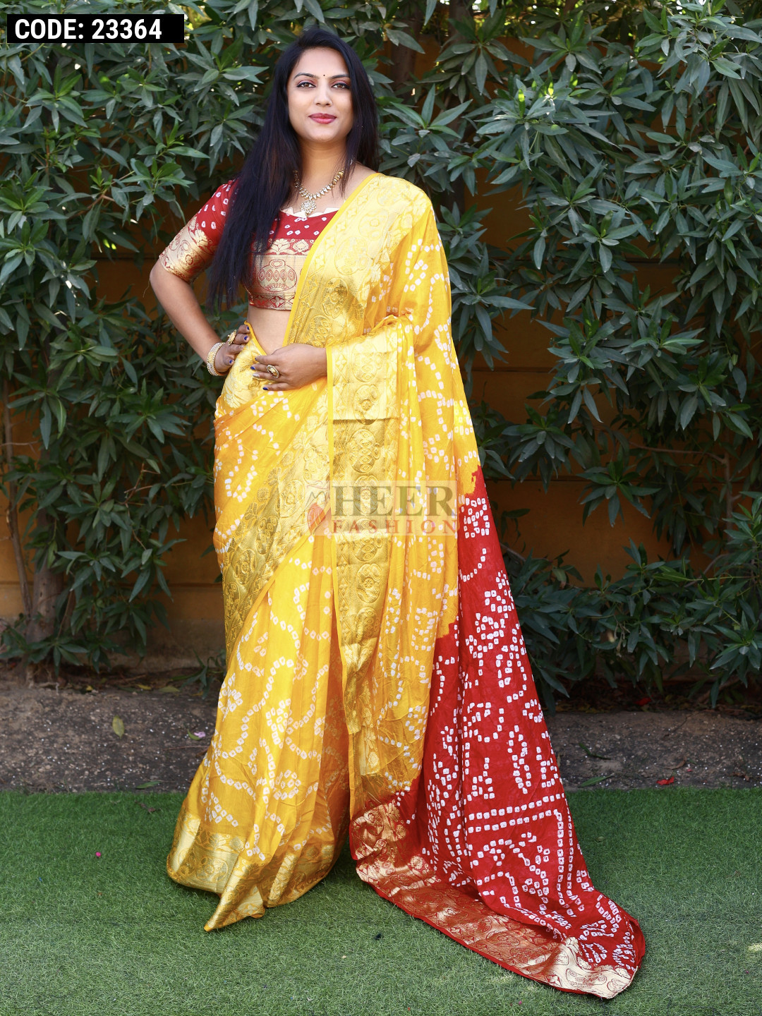 Yellow color bandhani silk saree with hand bandhej work