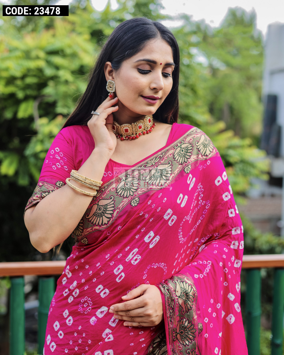 Rani pink color pure hand bandhej silk saree with printed work