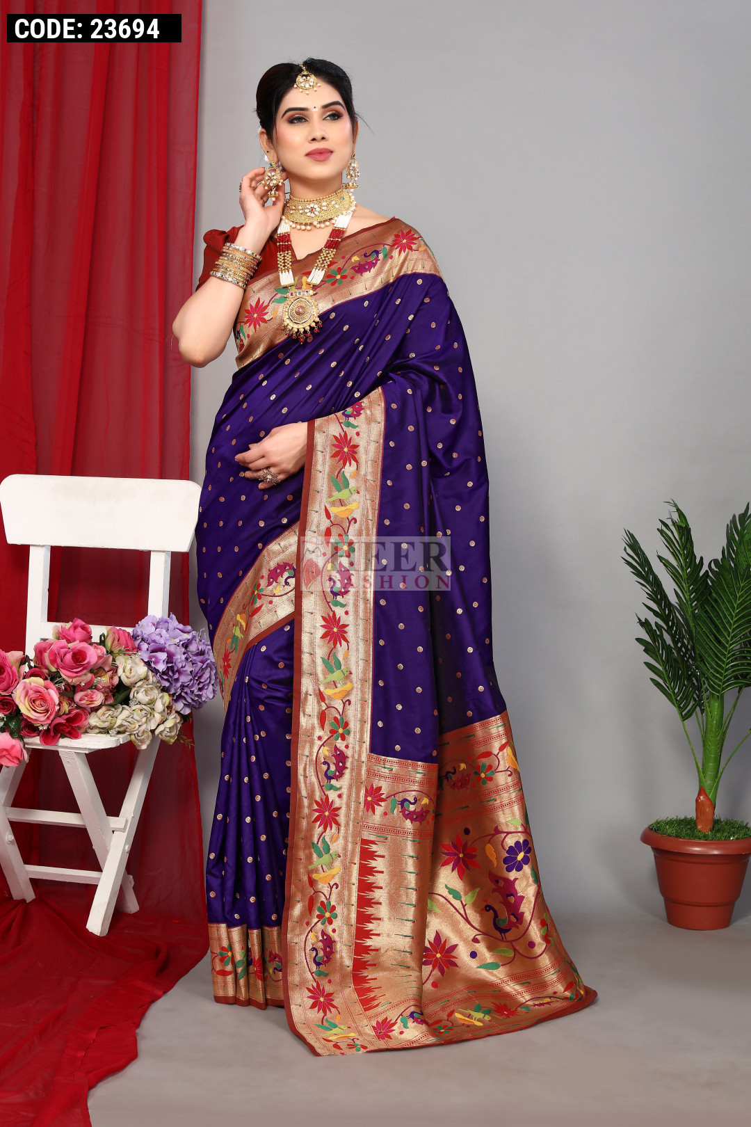 Violet color paithani silk saree with zari weaving work