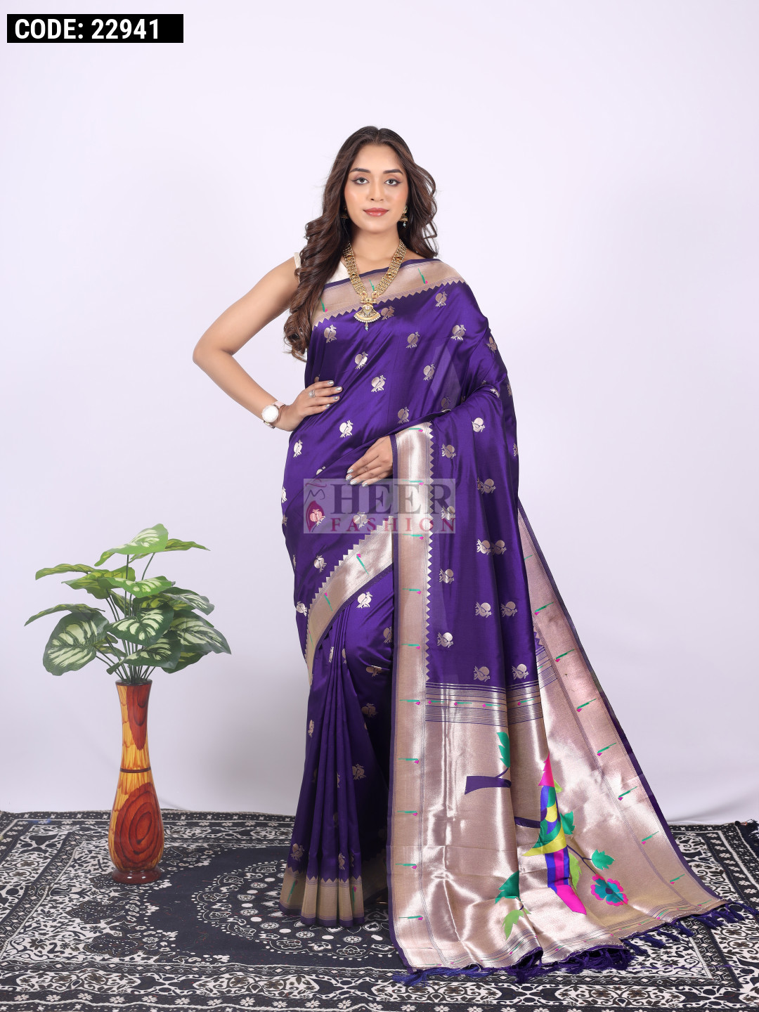 Violet color paithani silk saree with zari weaving work