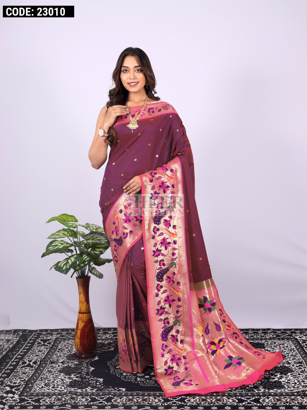 Magenta color paithani silk saree with zari woven work