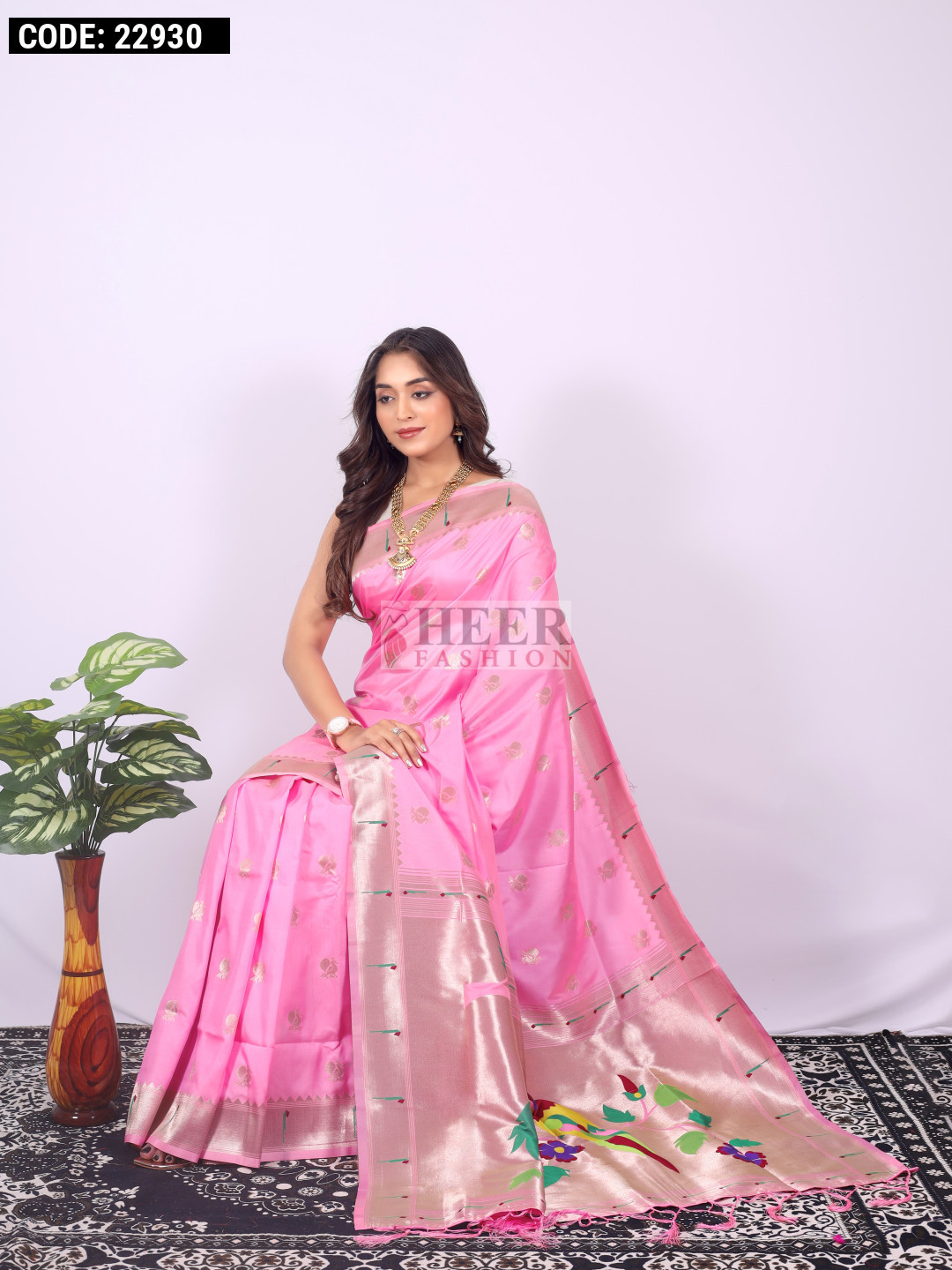 Baby pink color paithani silk saree with zari weaving work