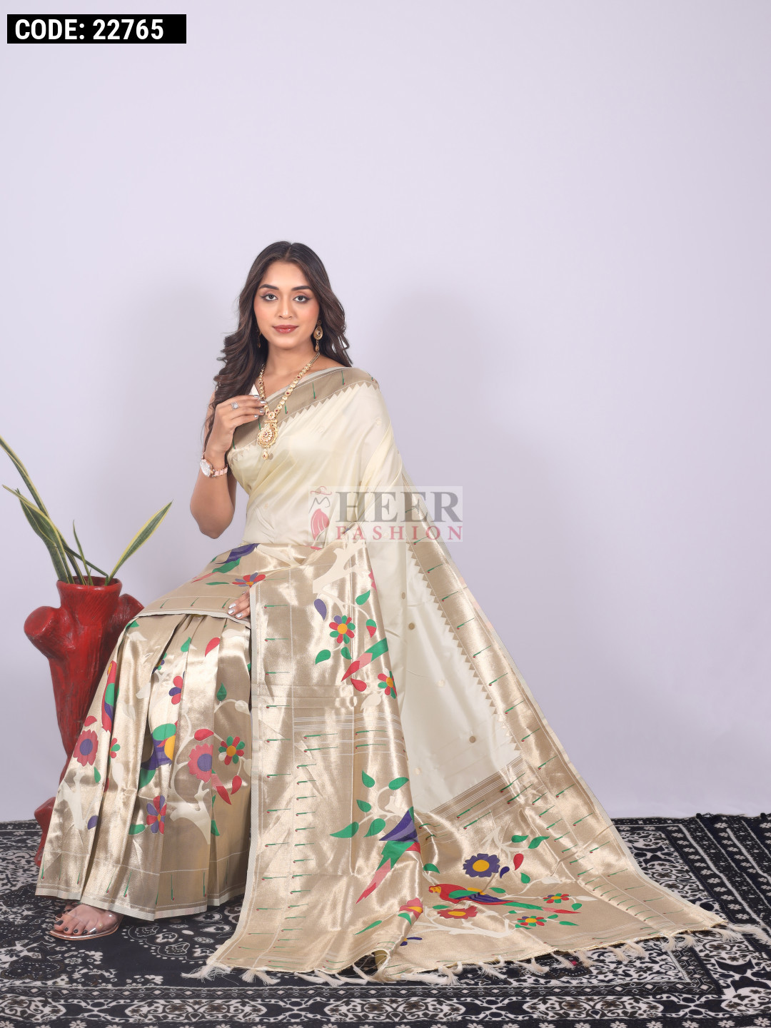 Off white color paithani silk saree with zari weaving work