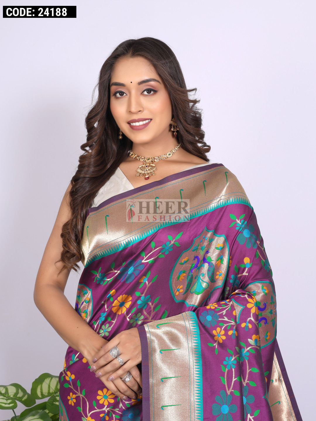 Magenta color paithani silk saree with zari weaving work